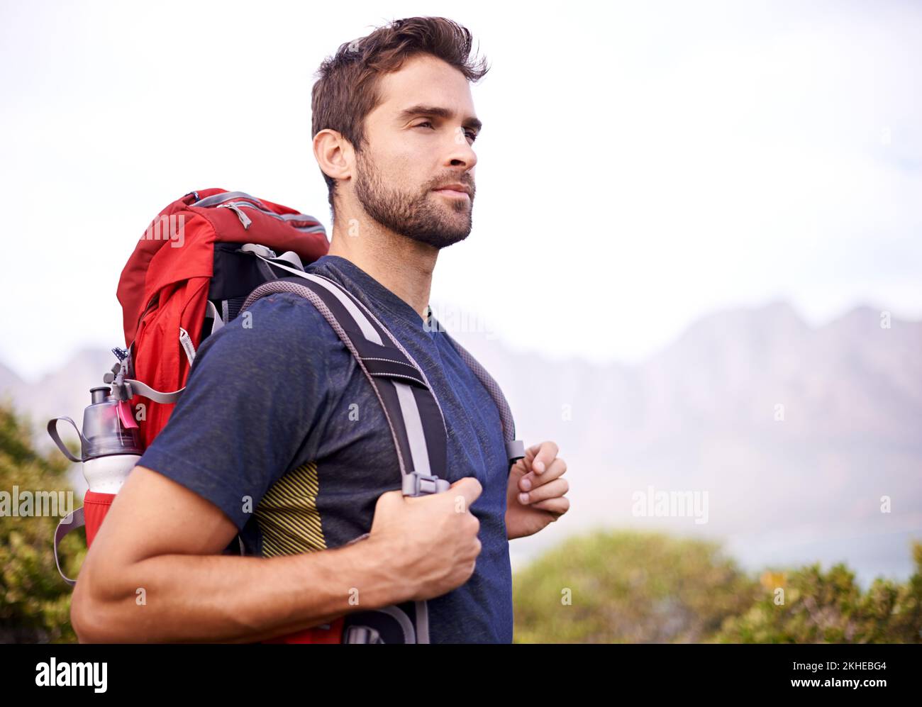 Lets take this hike to a higher level. a young man enjoying a hike ...