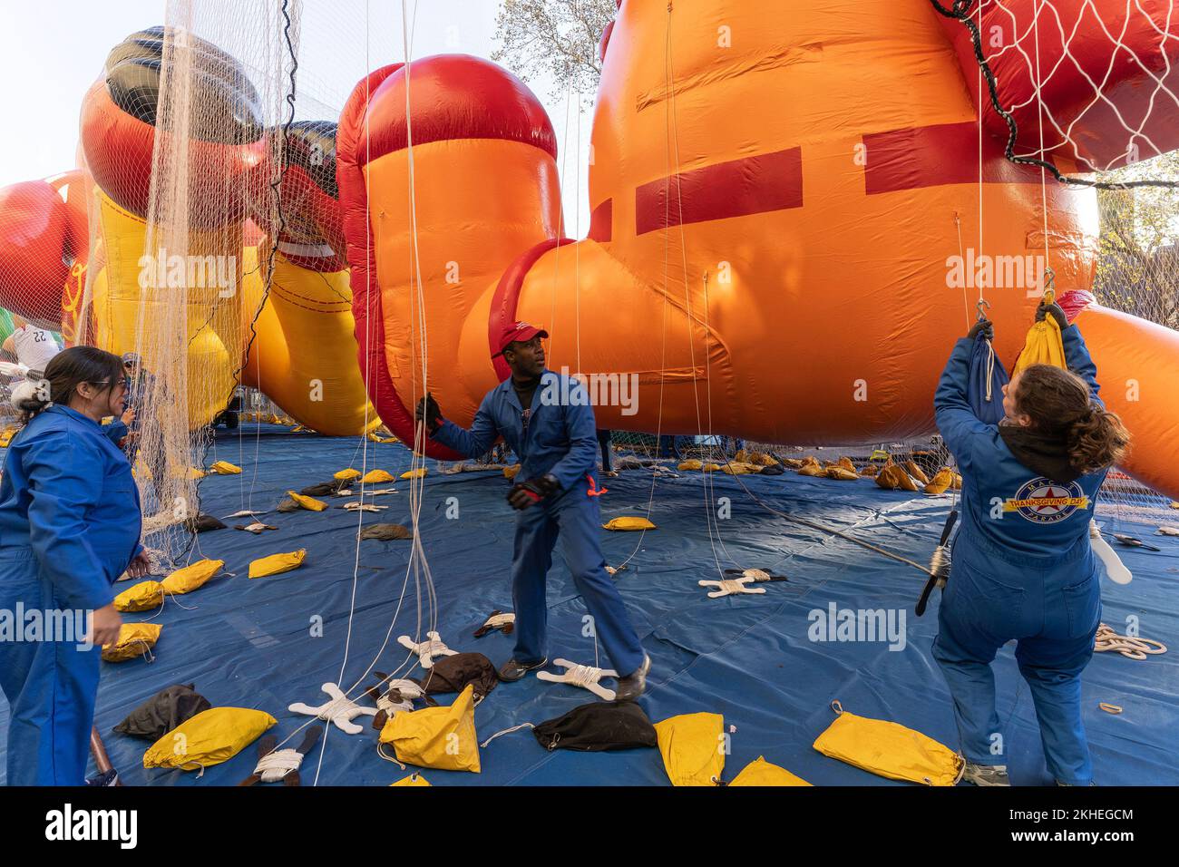 Workers work on balloons inflation for 96th Macy's Thanksgiving Day ...