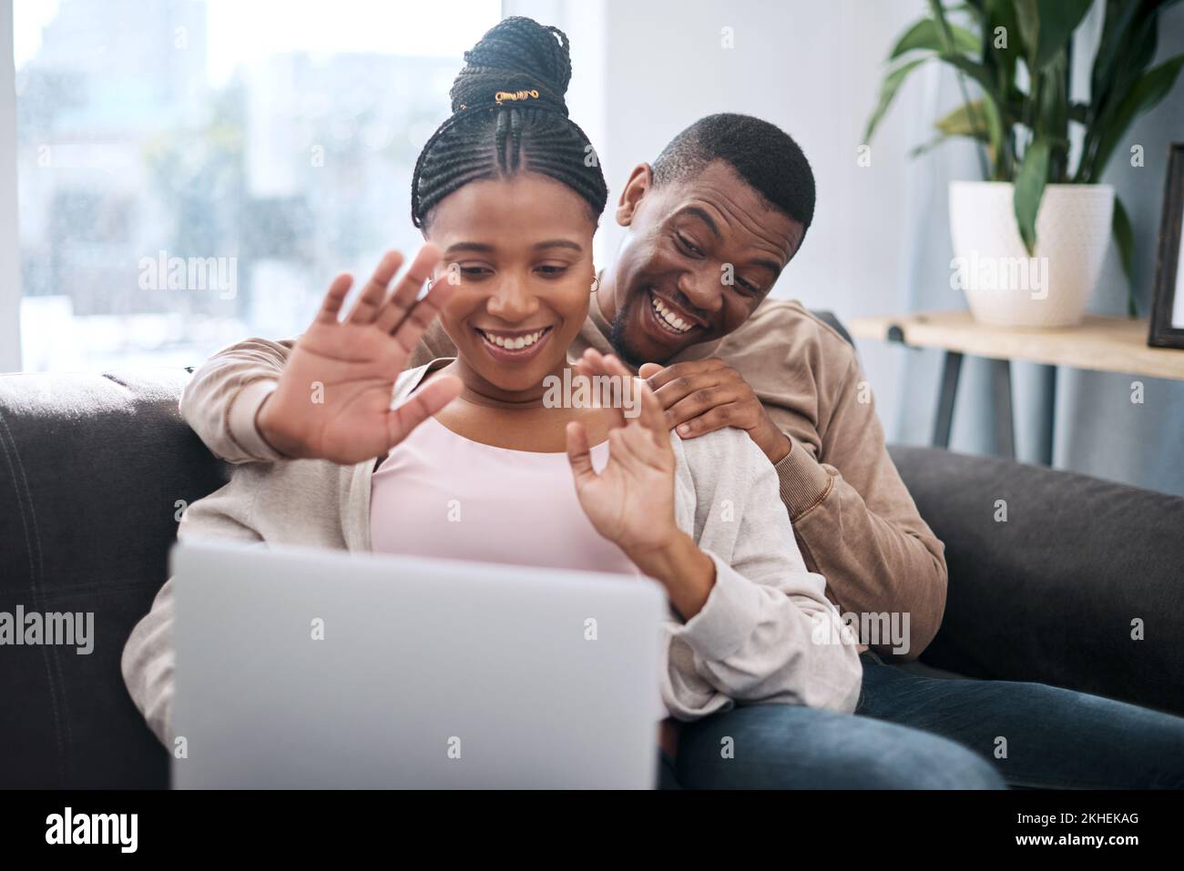 Wave, black couple and video call on laptop, smile and happy to connect ...