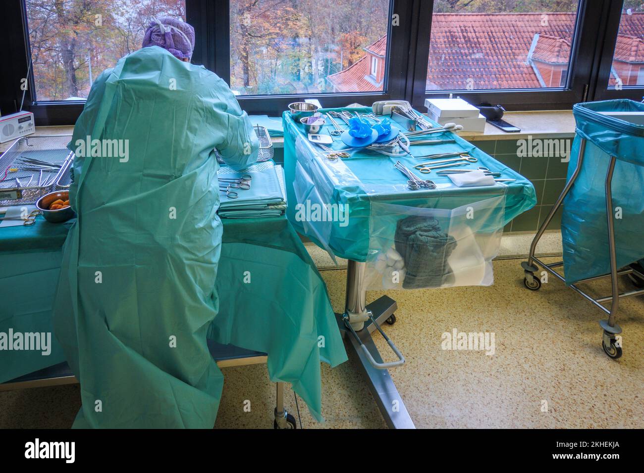 operating room nurse prepares instruments for an operation Stock Photo ...
