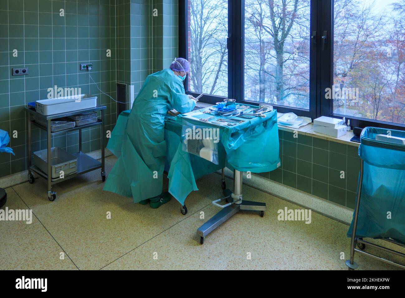 operating room nurse prepares instruments for an operation Stock Photo ...