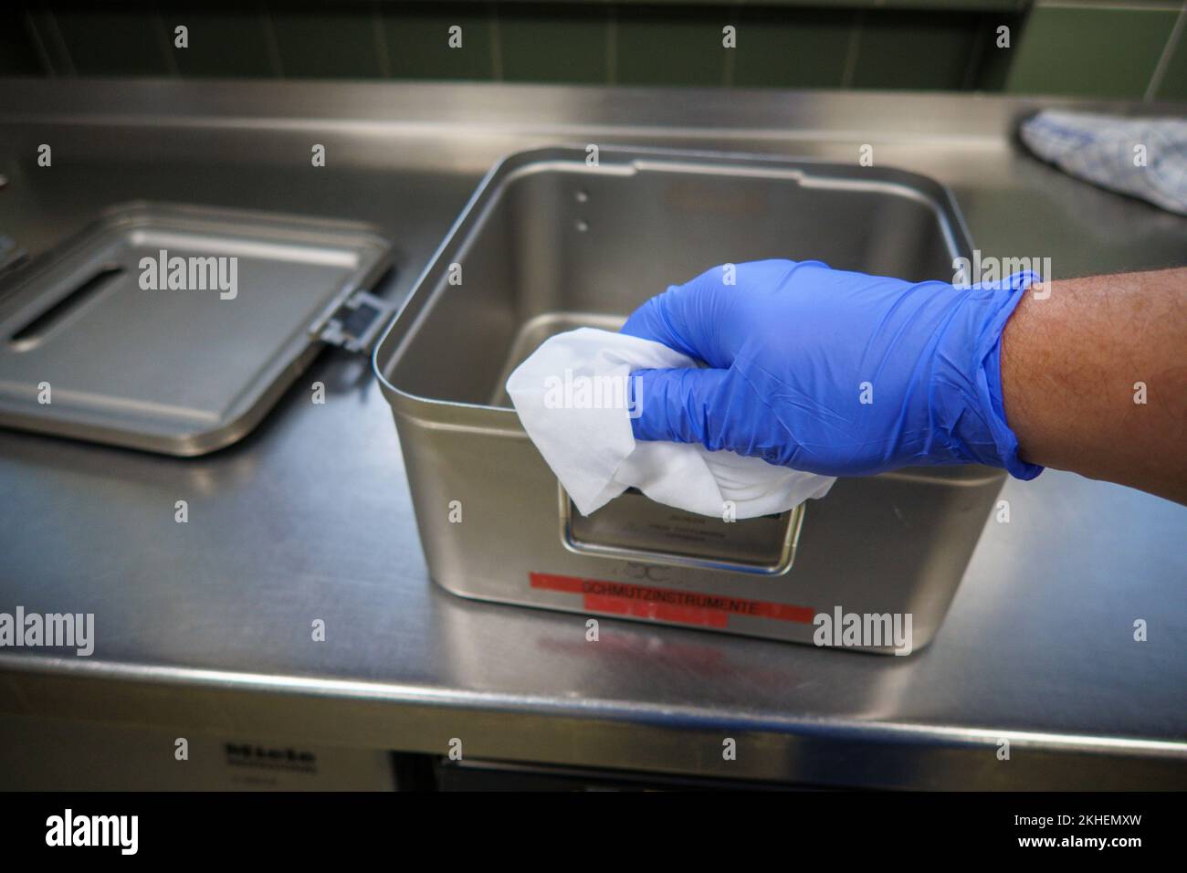 instrument container is cleaned with a disinfectant wipe Stock Photo ...