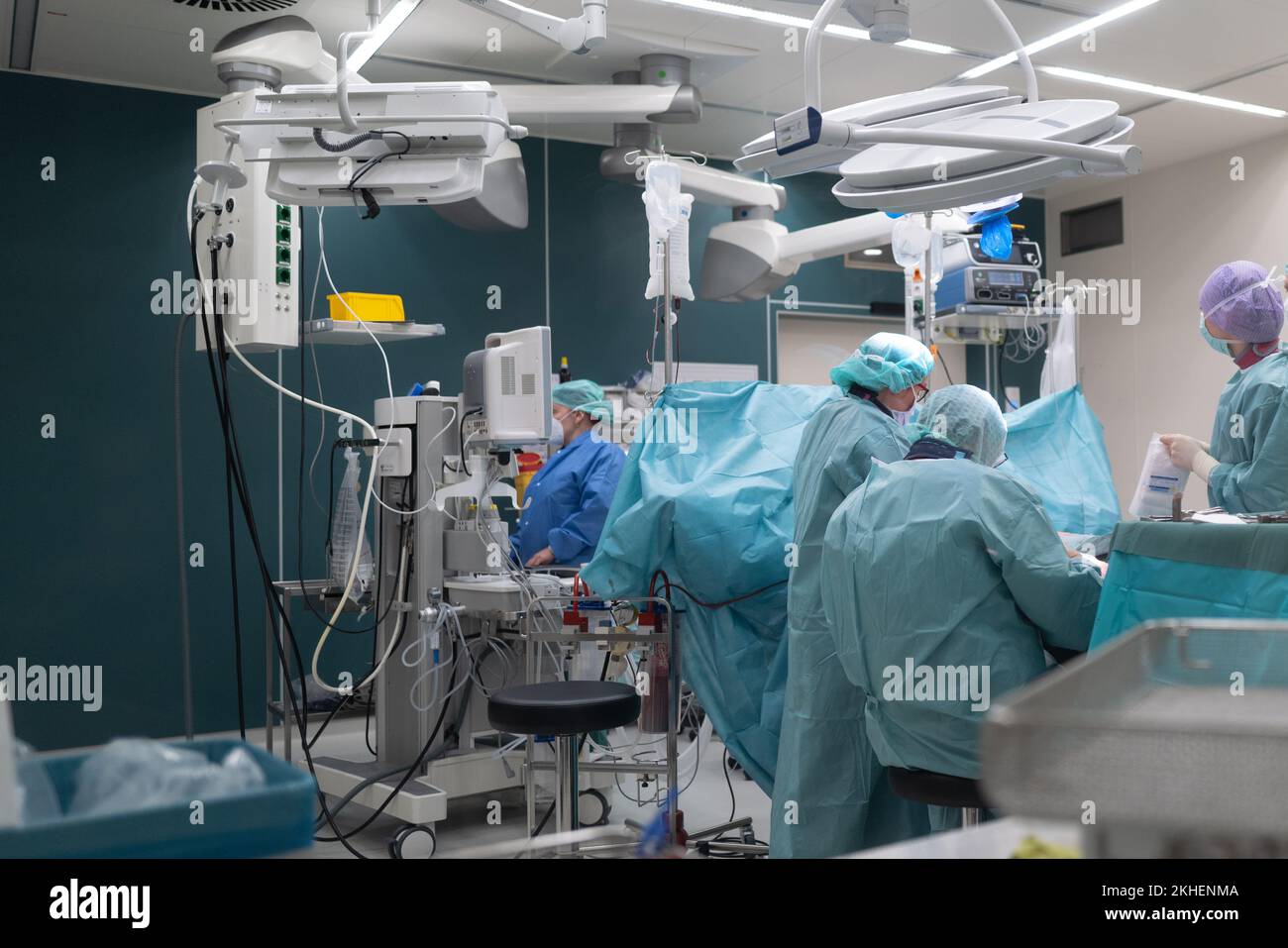 an operation is performed in an operating room in a hospital Stock ...