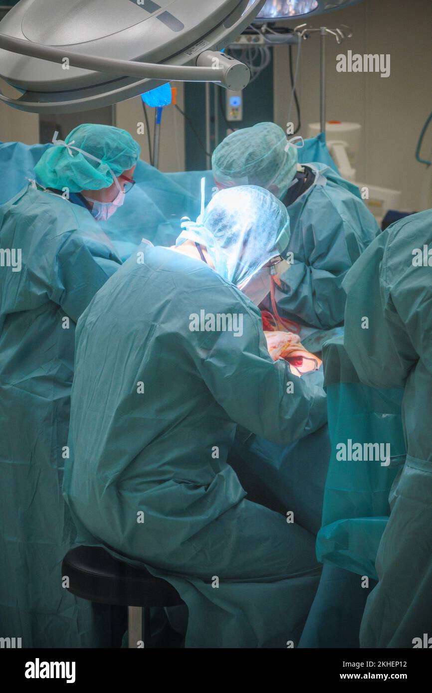 Surgical operation performed female surgeon hi-res stock photography ...