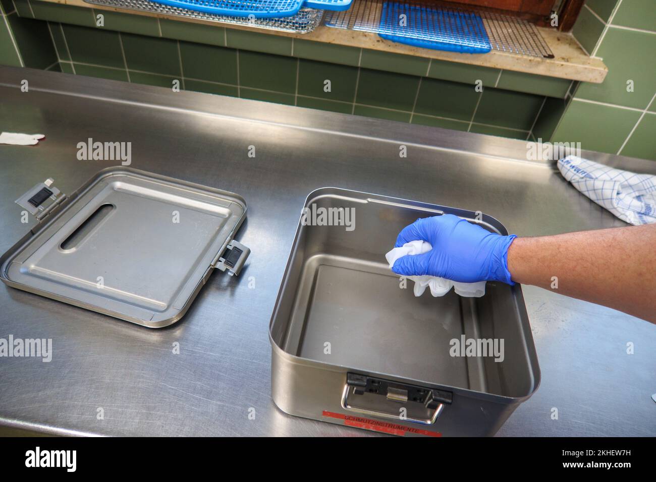 instrument container is cleaned with a disinfectant wipe Stock Photo ...
