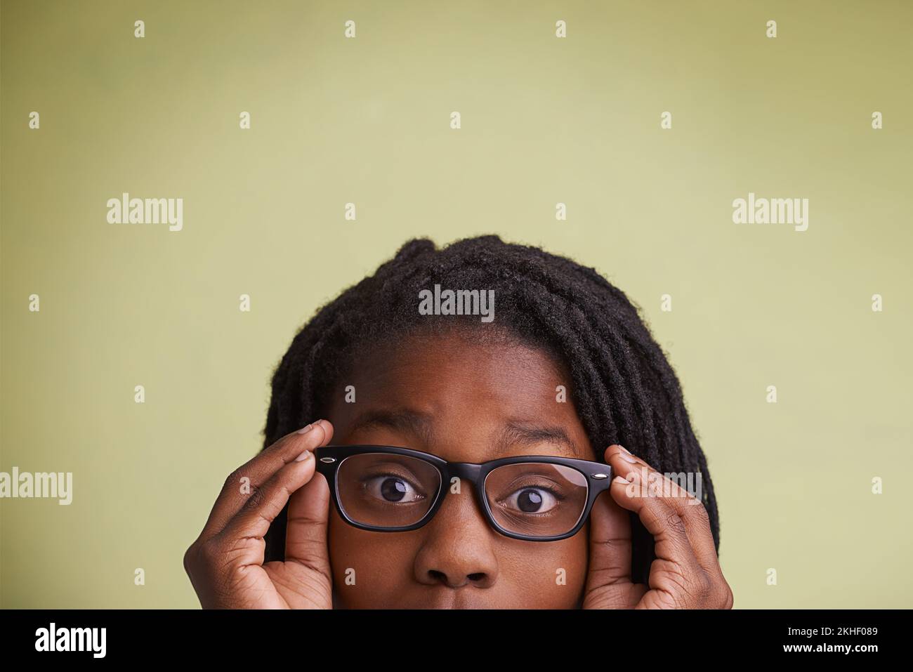 Do my eyes deceive me. Cropped studio portrait of a young boy wearing ...