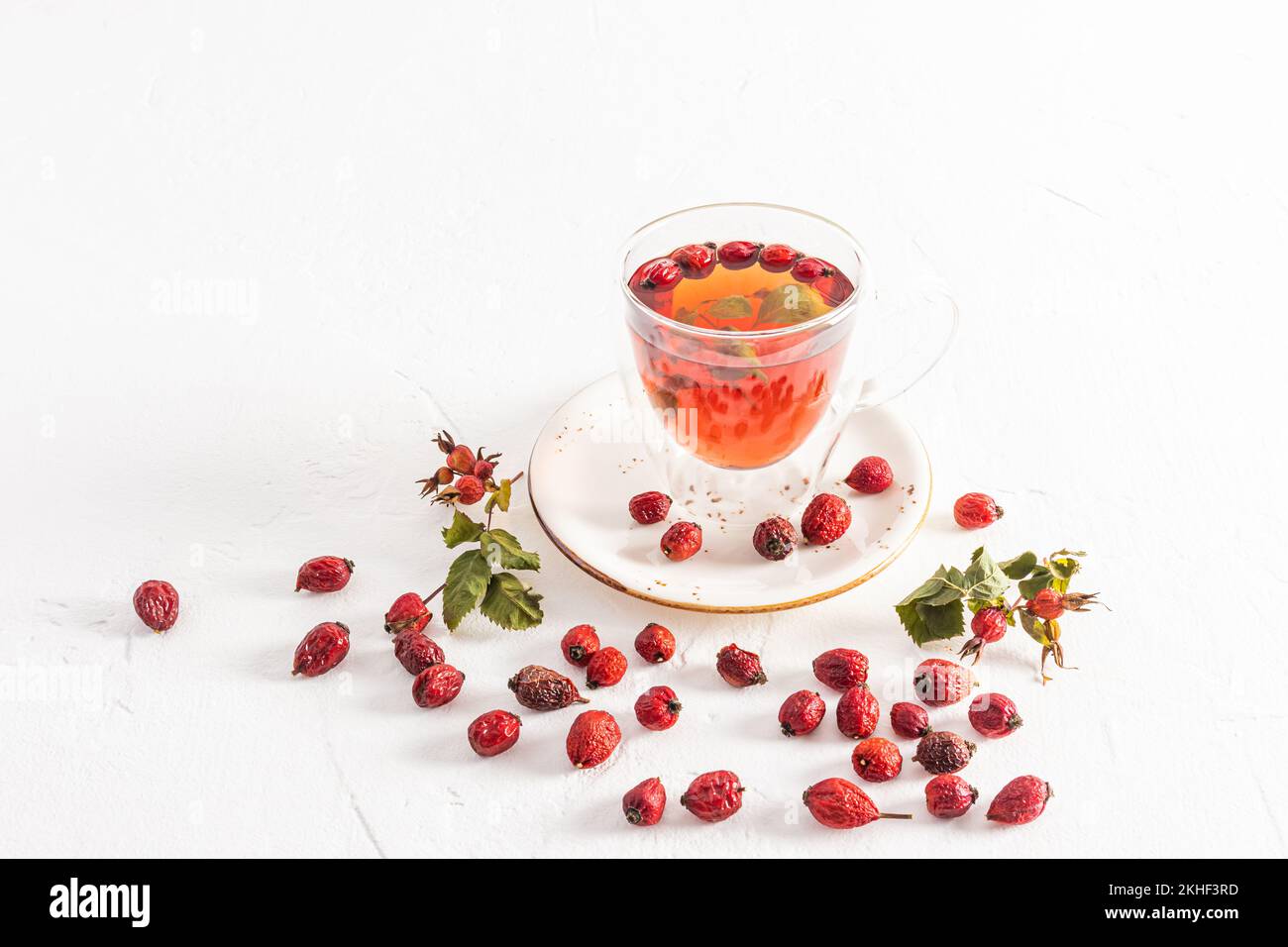 glass cup with double bottom with vitamin hot tea from rose hips on a ...