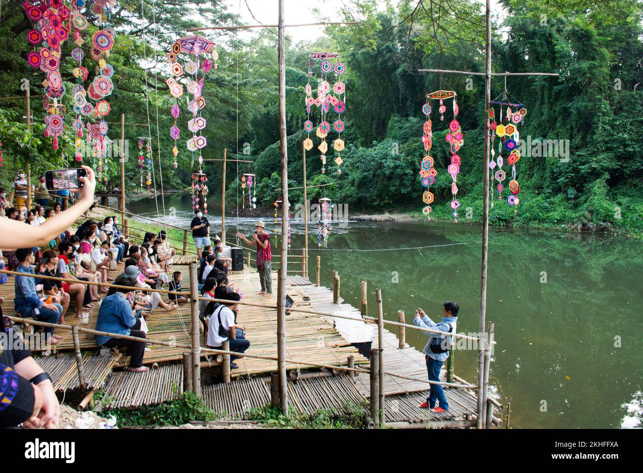 Thai people foreign travelers travel visit waiting join tradition merit ...