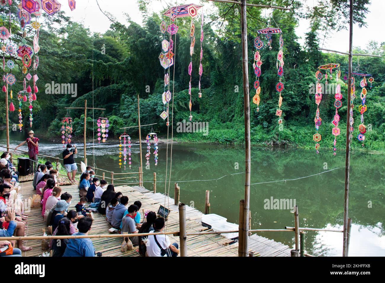 Thai people foreign travelers travel visit waiting join tradition merit ...