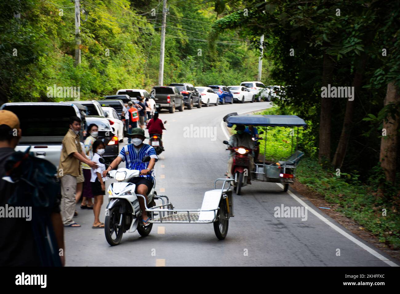 Thai people driver driving tricycle send receive travelers passengers ...