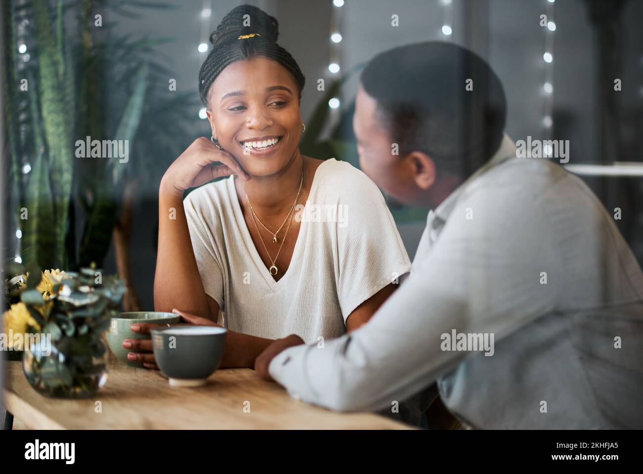 Love, black couple and talking at cafe with coffee on romantic date ...