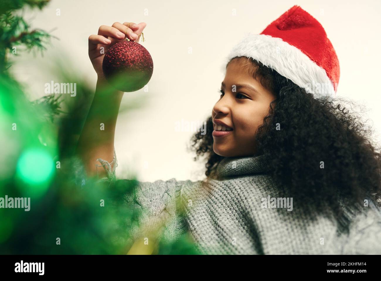 Christmas, decoration and girl with smile for tree, holiday and ...