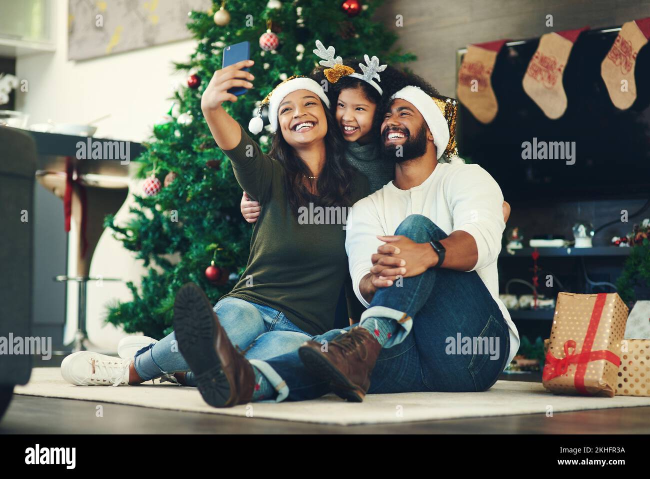 Christmas selfie, family and happy with holiday and celebration, mother ...
