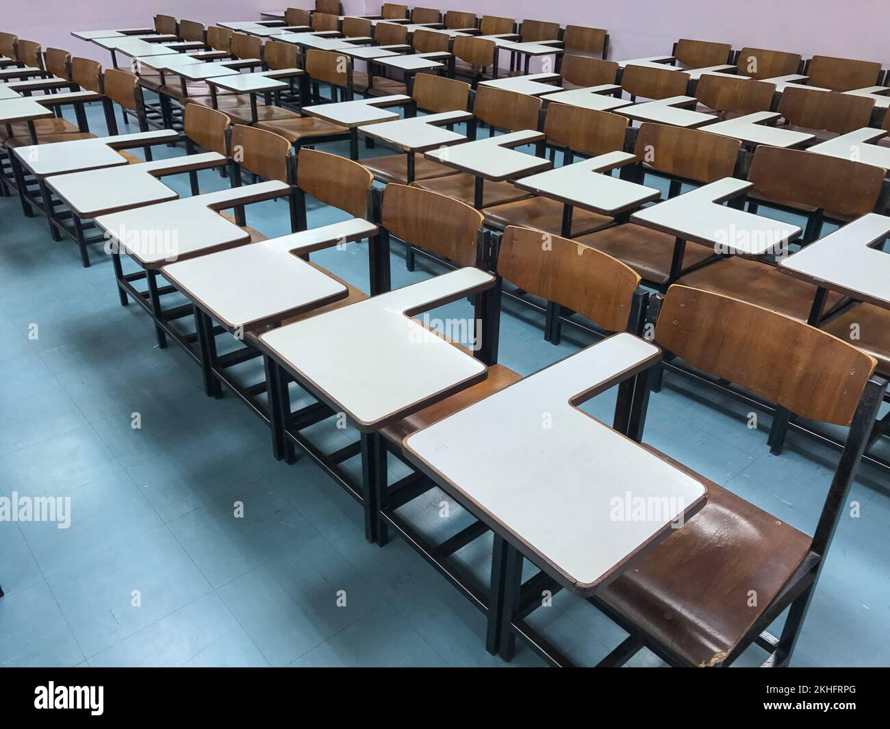 Wooden chairs in the classroom background Stock Photo - Alamy