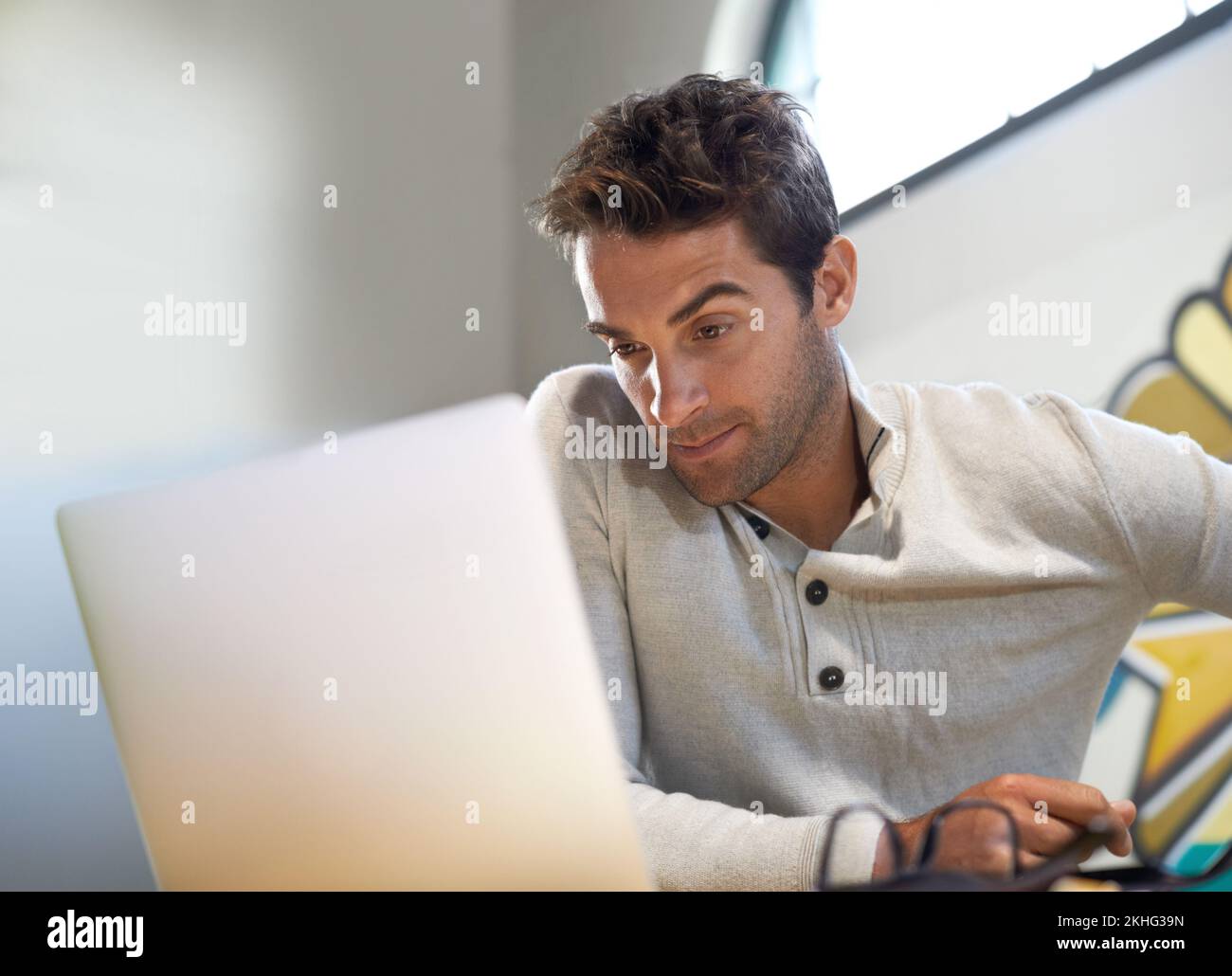 Focused on finding original ideas. A thoughtful young entrepreneur ...