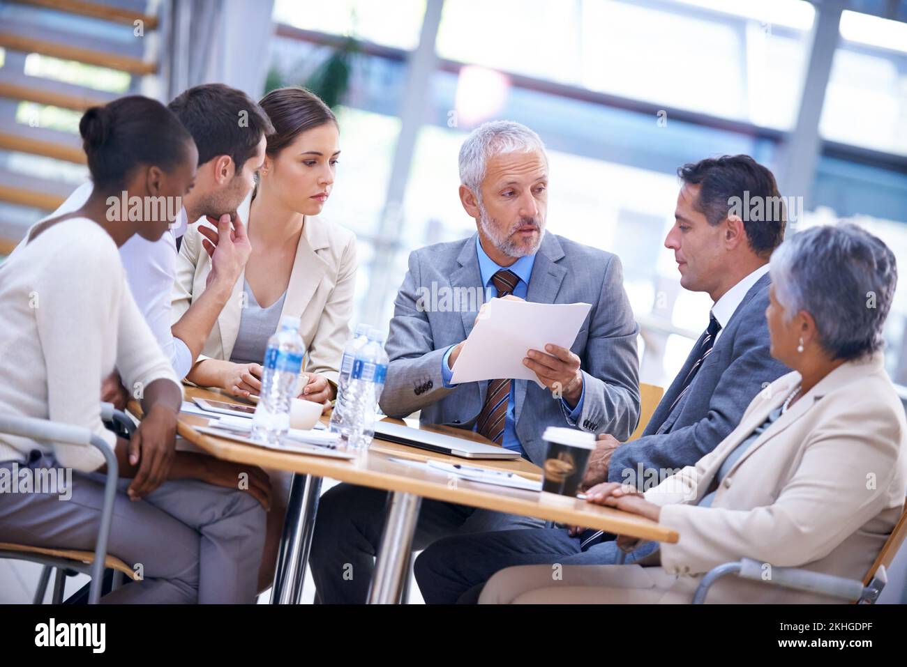 Meeting of the minds. A group of businesspeople having a meeting ...