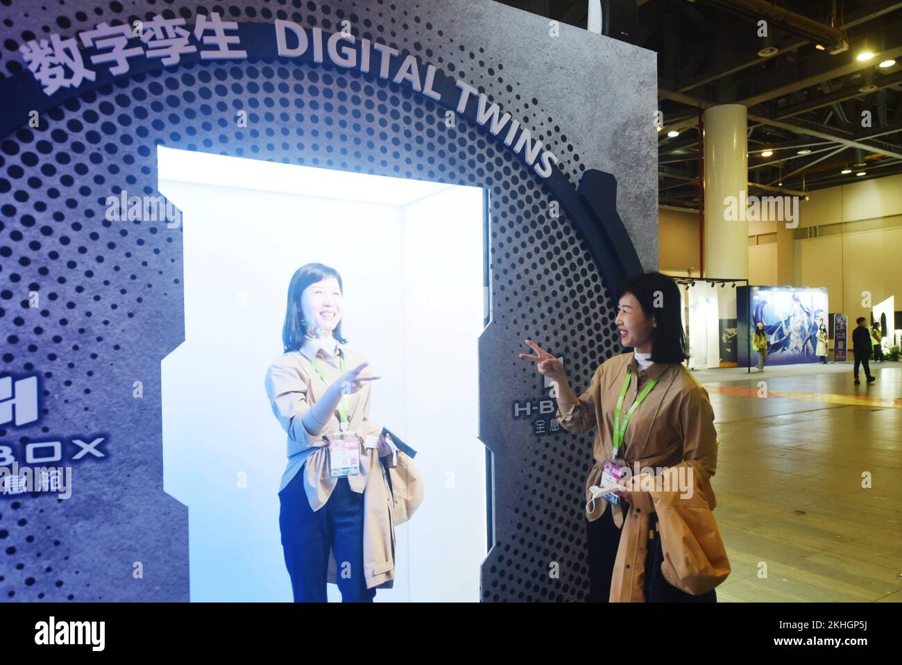 HANGZHOU, CHINA - NOVEMBER 24, 2022 - Visitors interact with the "self ...