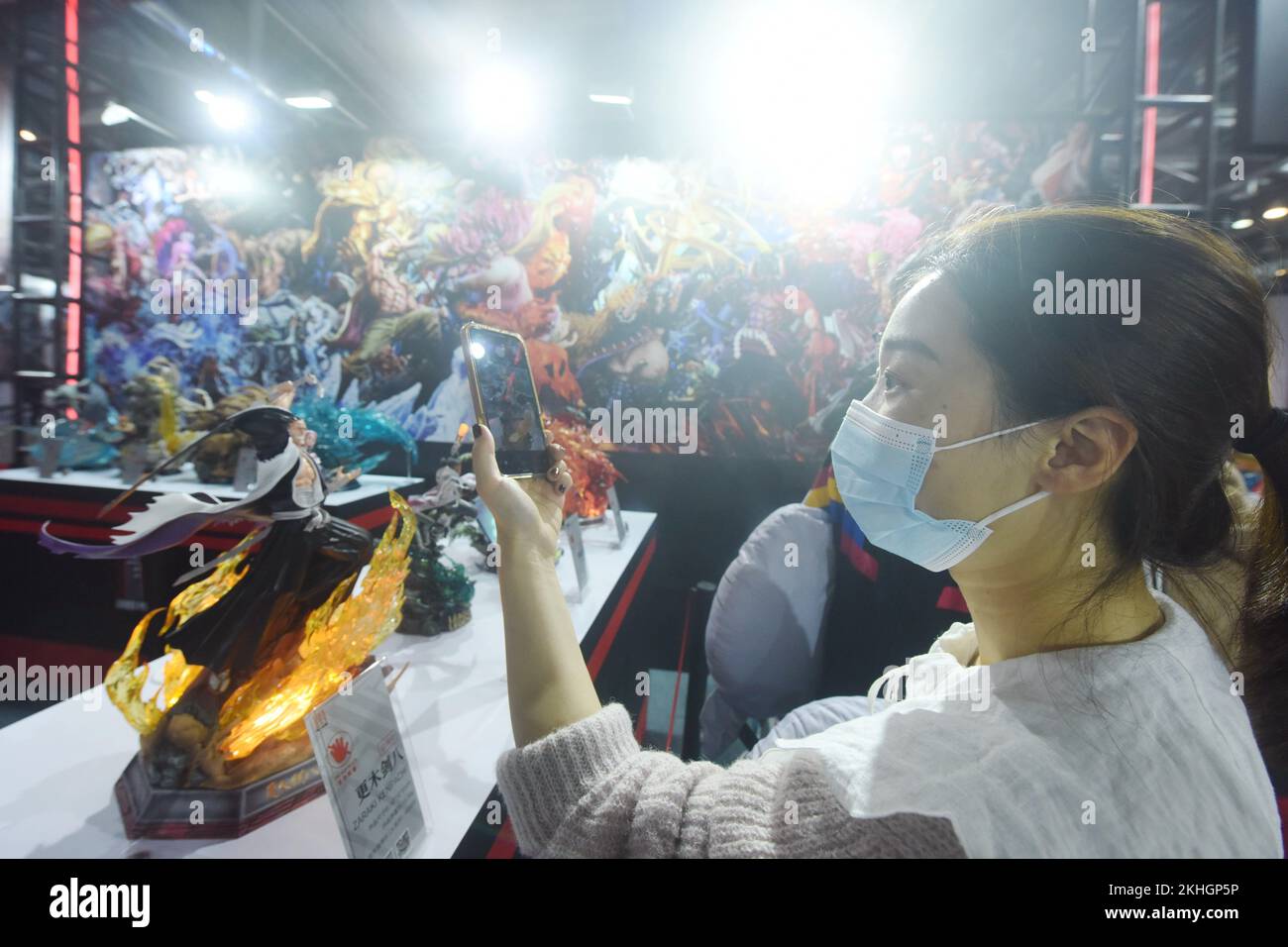 HANGZHOU, CHINA - NOVEMBER 24, 2022 - Visitors look at anime models at ... HANGZHOU, CHINA - NOVEMBER 24, 2022 - Visitors look at anime models at ...