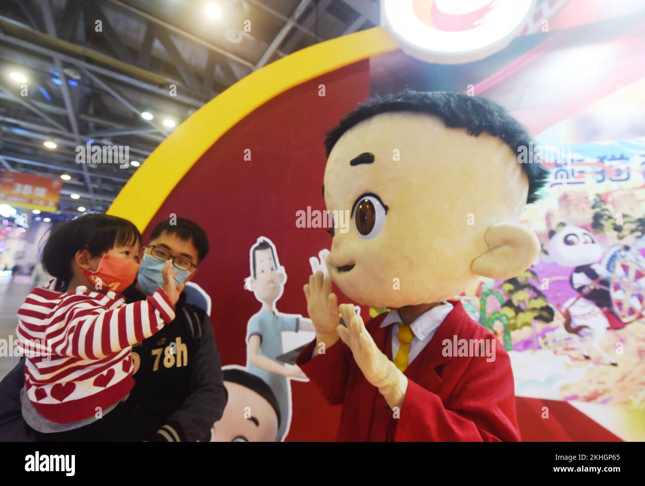 HANGZHOU, CHINA - NOVEMBER 24, 2022 - Children interact with cartoon ...