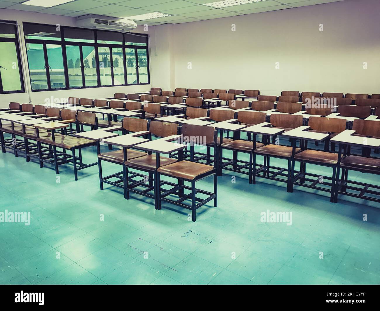 Wooden chairs in the classroom background Stock Photo - Alamy