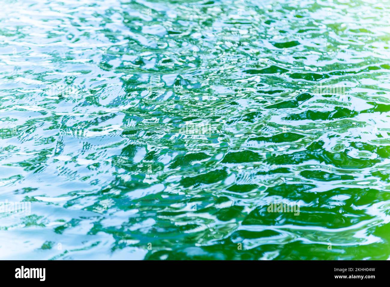 Water wave reflection use for background Stock Photo - Alamy