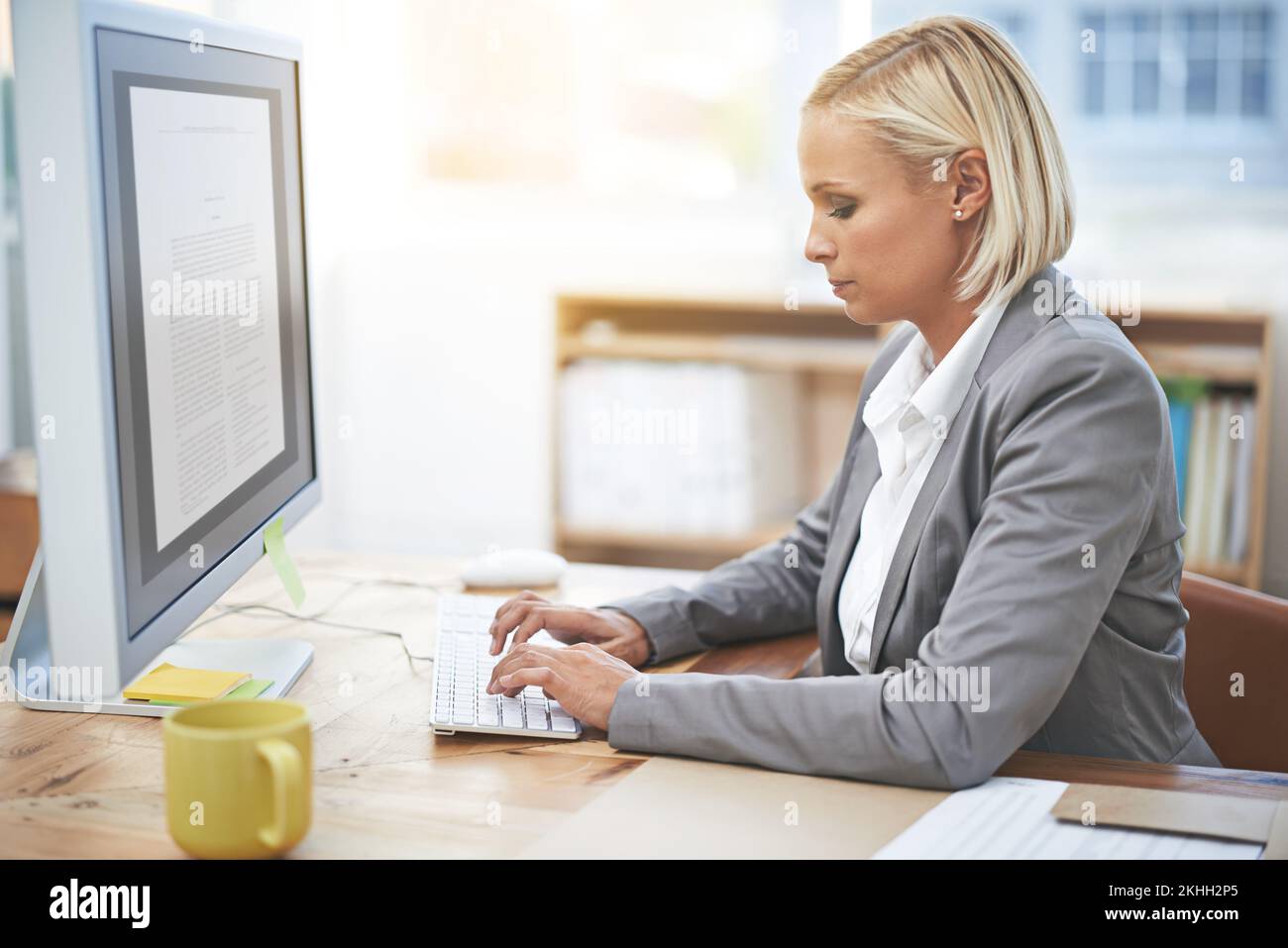 Working at desktop computer hi-res stock photography and images - Alamy