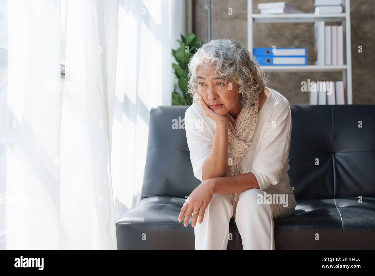 Pensive older woman lonely old senior in is home Stock Photo - Alamy