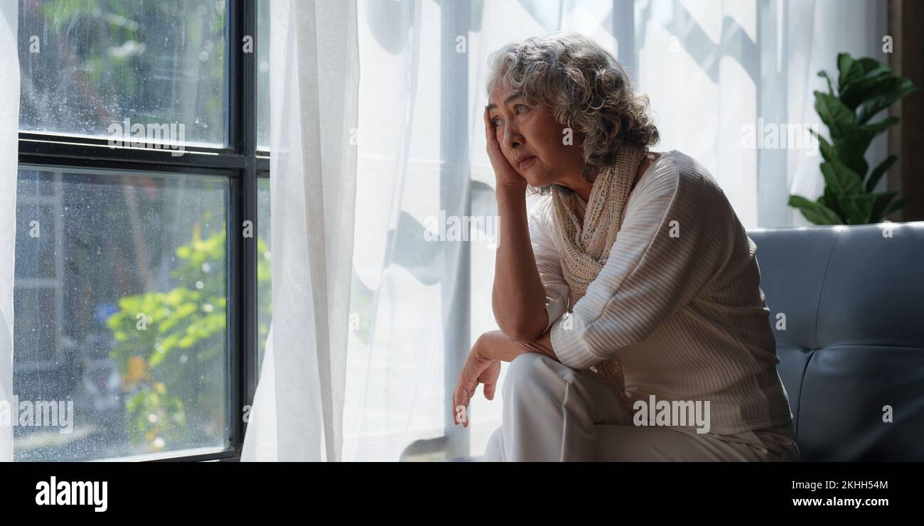 Pensive older woman lonely old senior in is home Stock Photo - Alamy