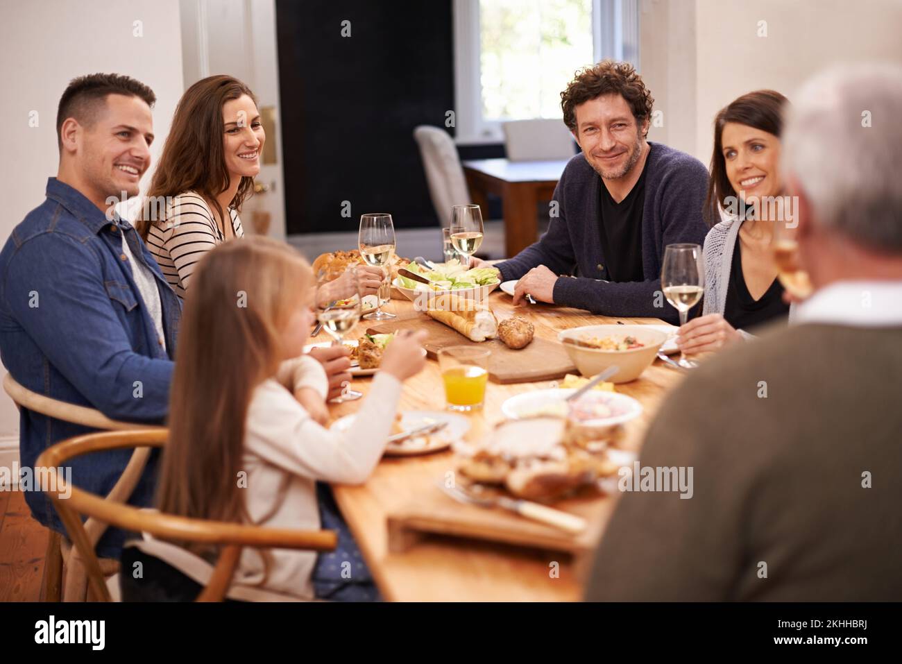 Friends and family are the true gifts in life. a family sitting down to ...