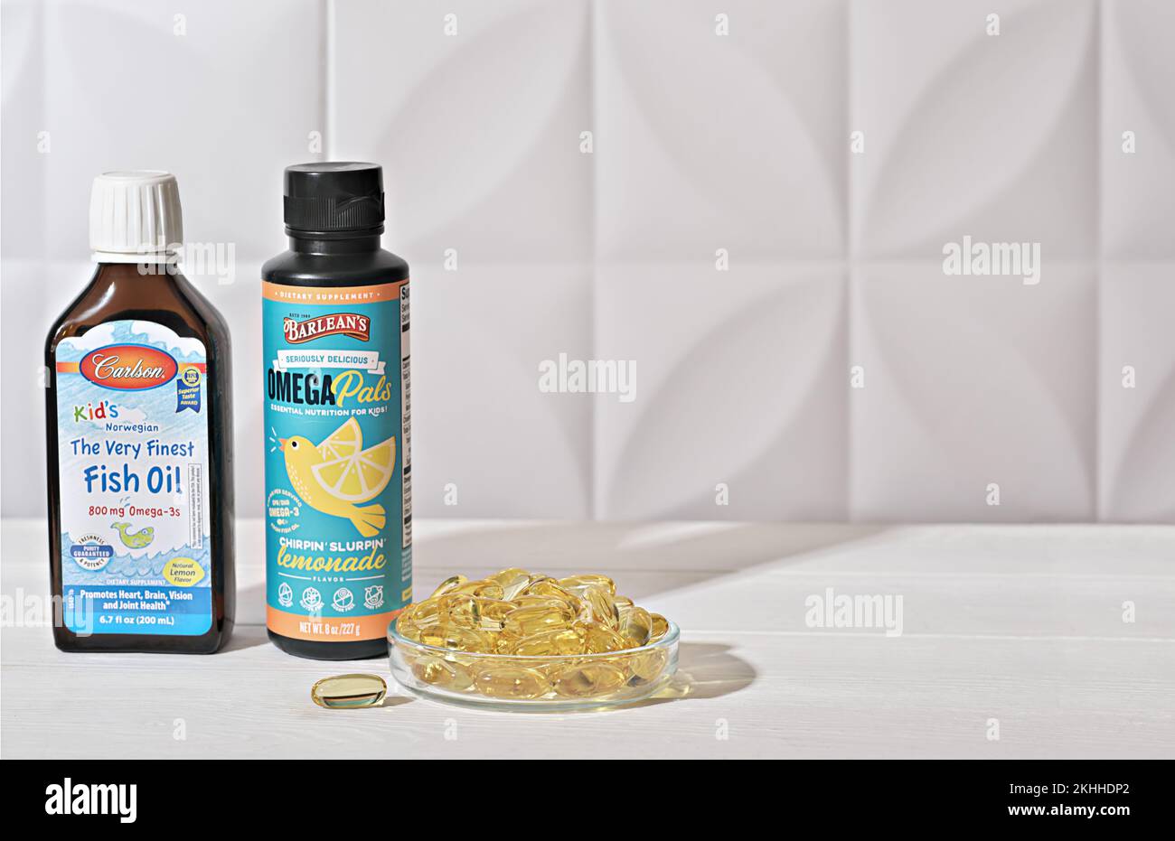 liquid children omega 3 food suplement in bottles and cod liver oil in ...