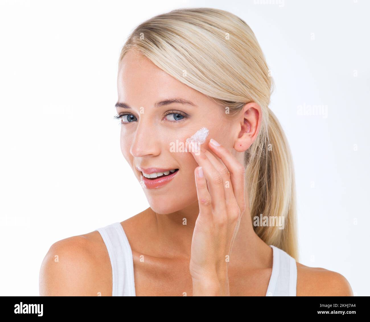 I cant get enough of this product. A beautiful young woman applying ...