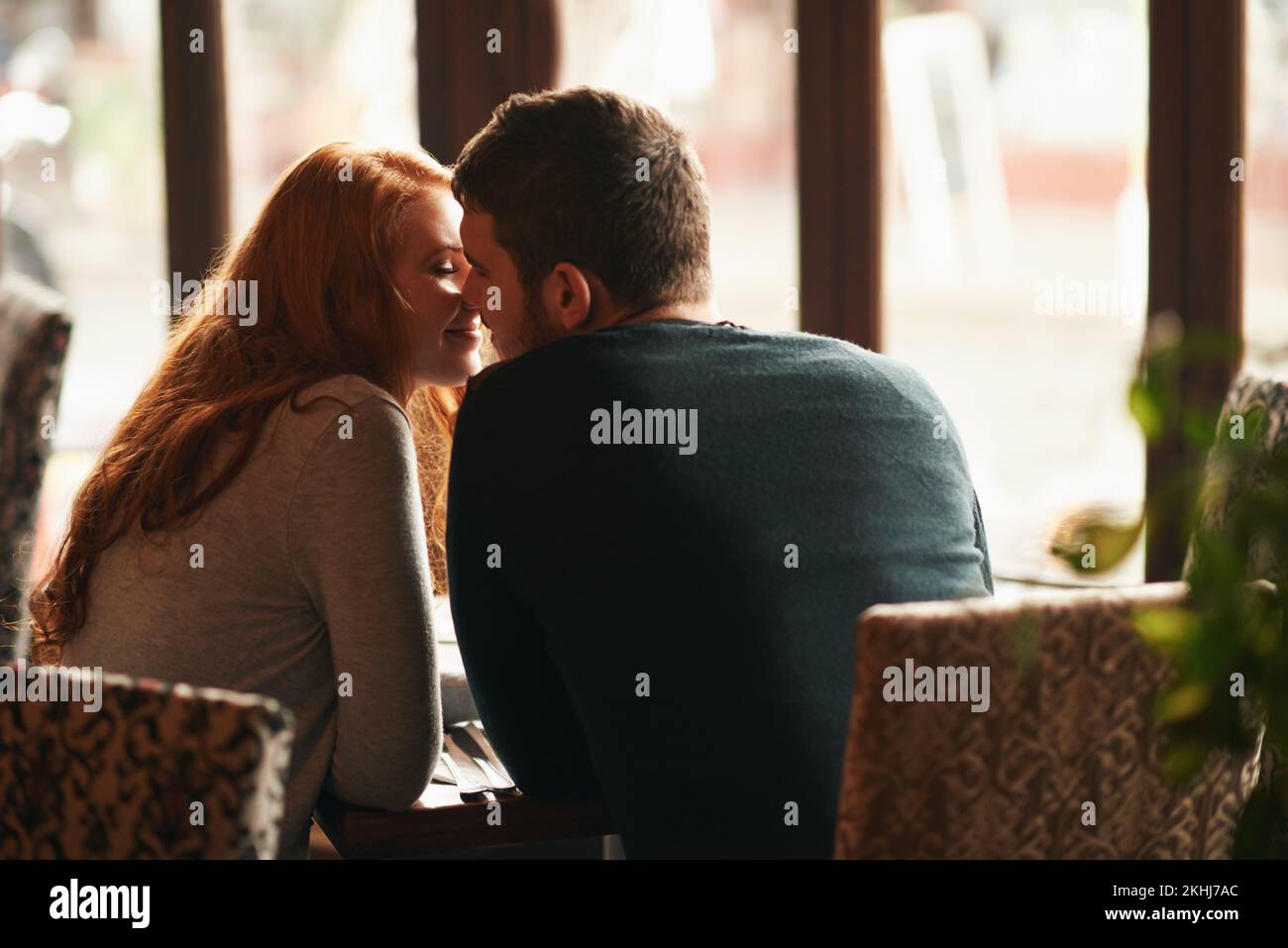 Lucky in love. Rear view shot of a loving young couple on a date Stock ...