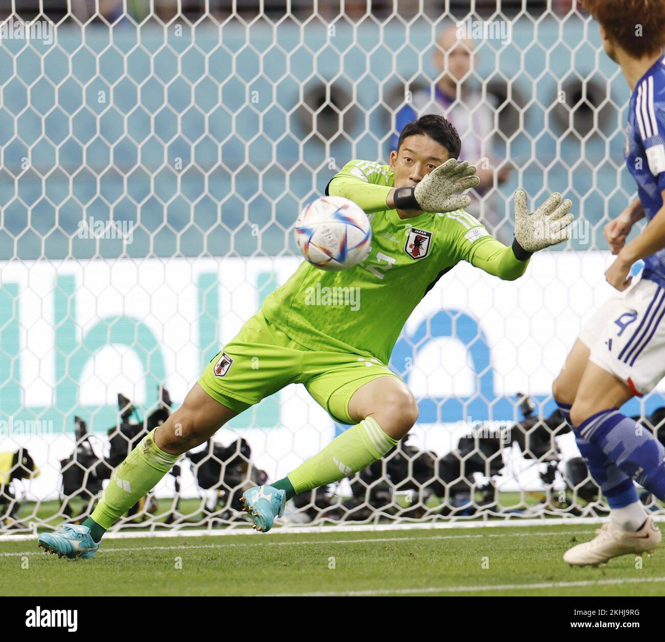 Japan goalkeeper Shuichi Gonda makes a save during the first half of a ...