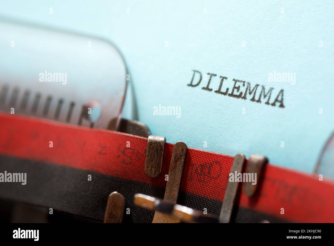 Dilemma word written with a typewriter Stock Photo - Alamy