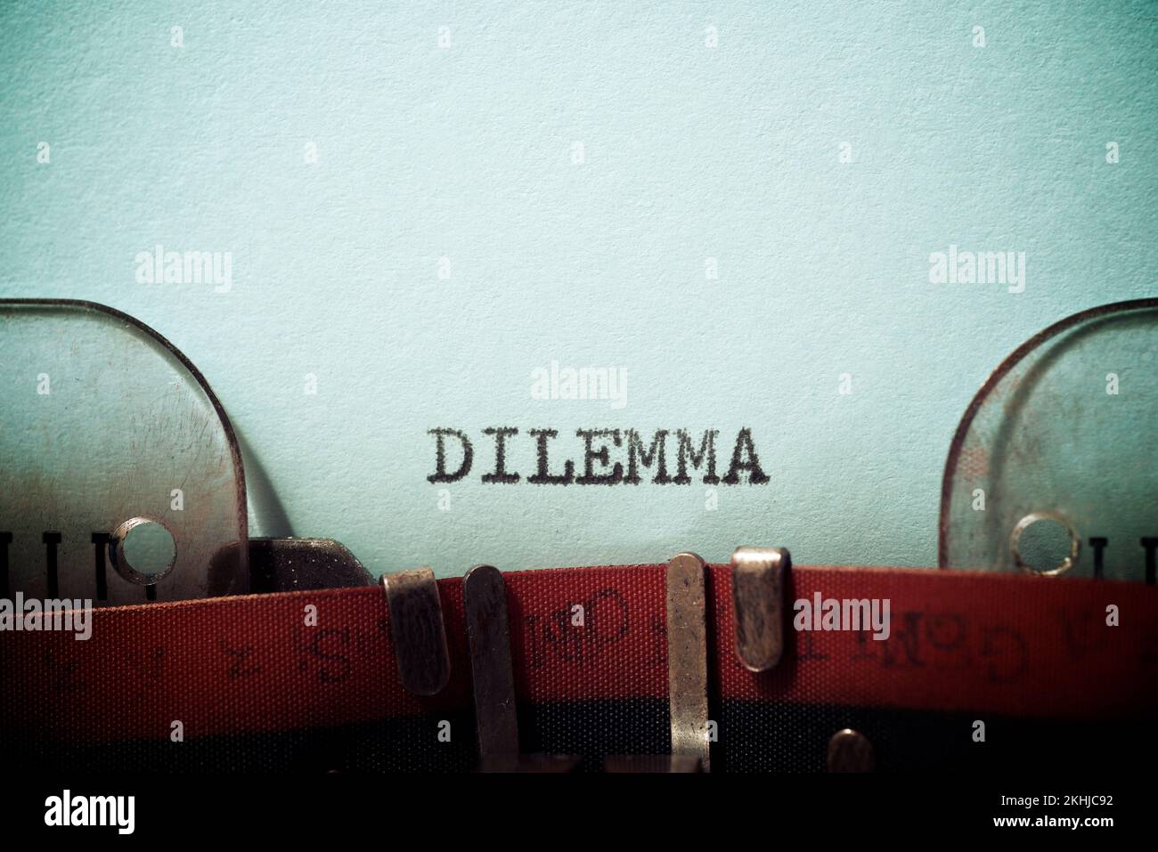 Dilemma word written with a typewriter Stock Photo - Alamy