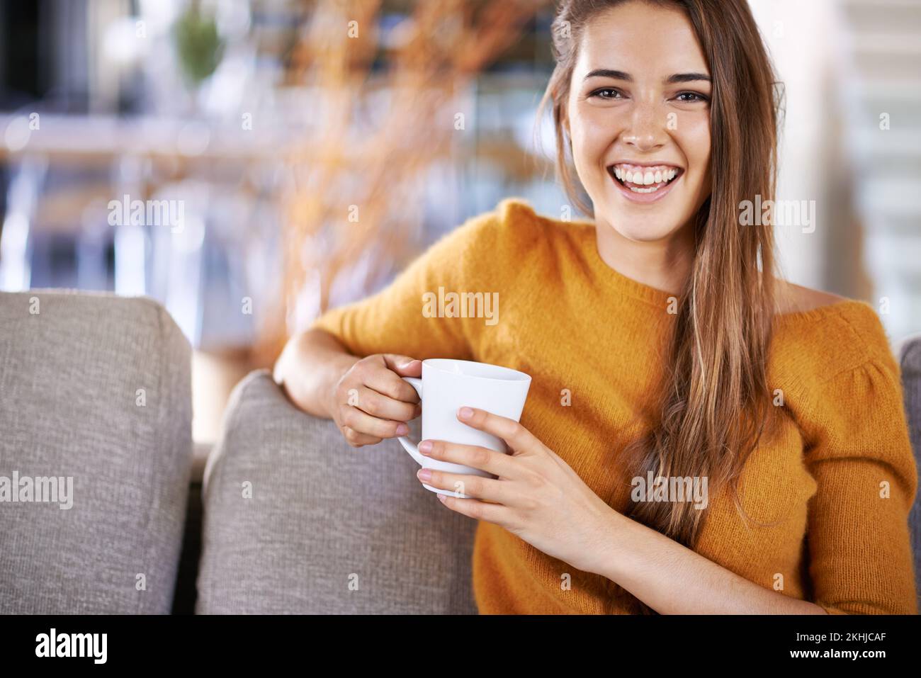 Coffee and leisure. Cropped image of a pretty young female drinking ...