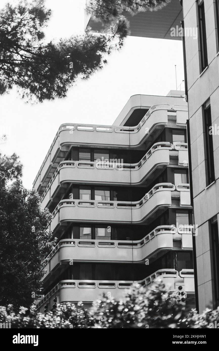 A residential building facade with growing tree Stock Photo - Alamy