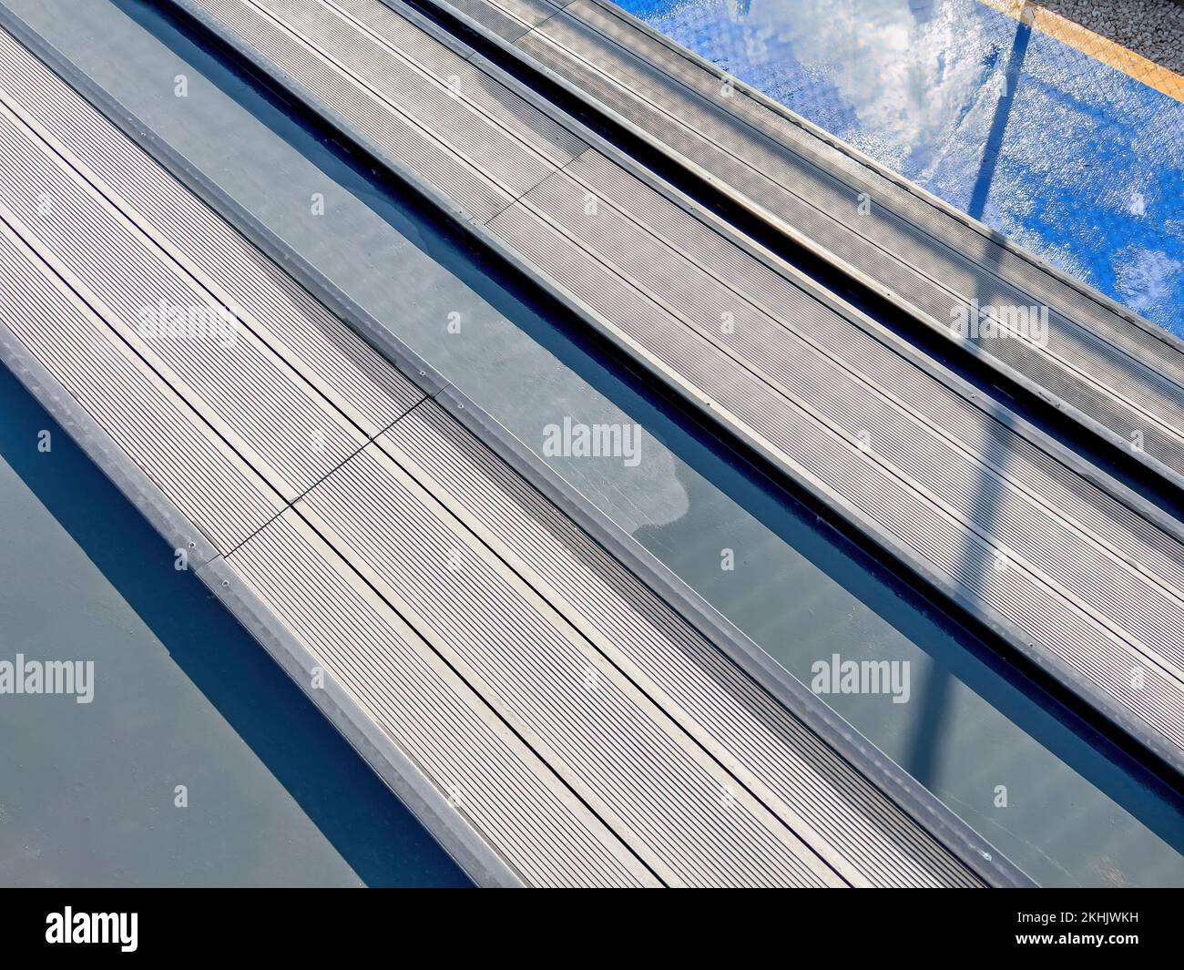 Seating area for spectators made with composite deck next to the tennis ...