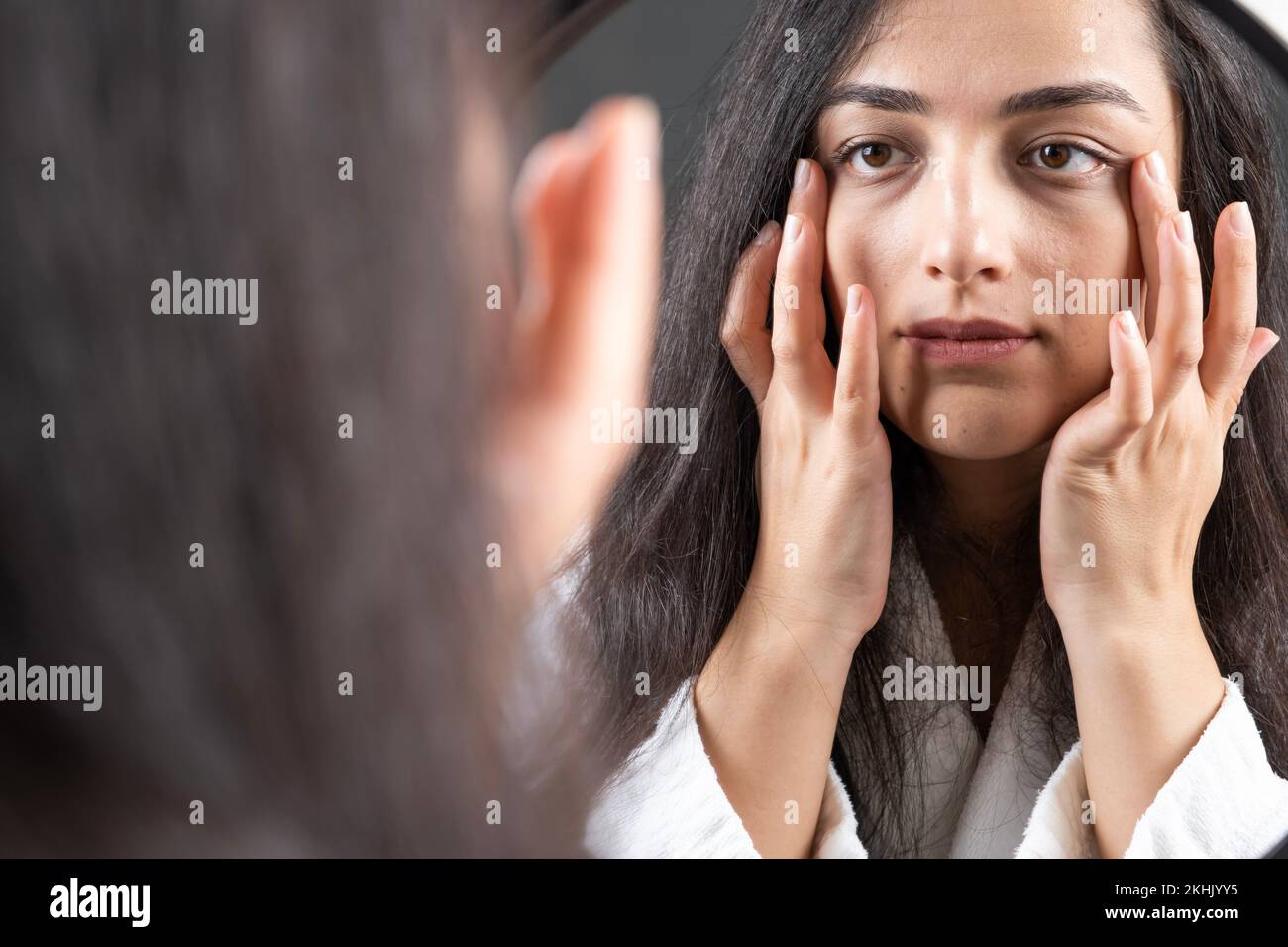 Touching Face Attractive Brunette Woman Looking Mirror Moisturized