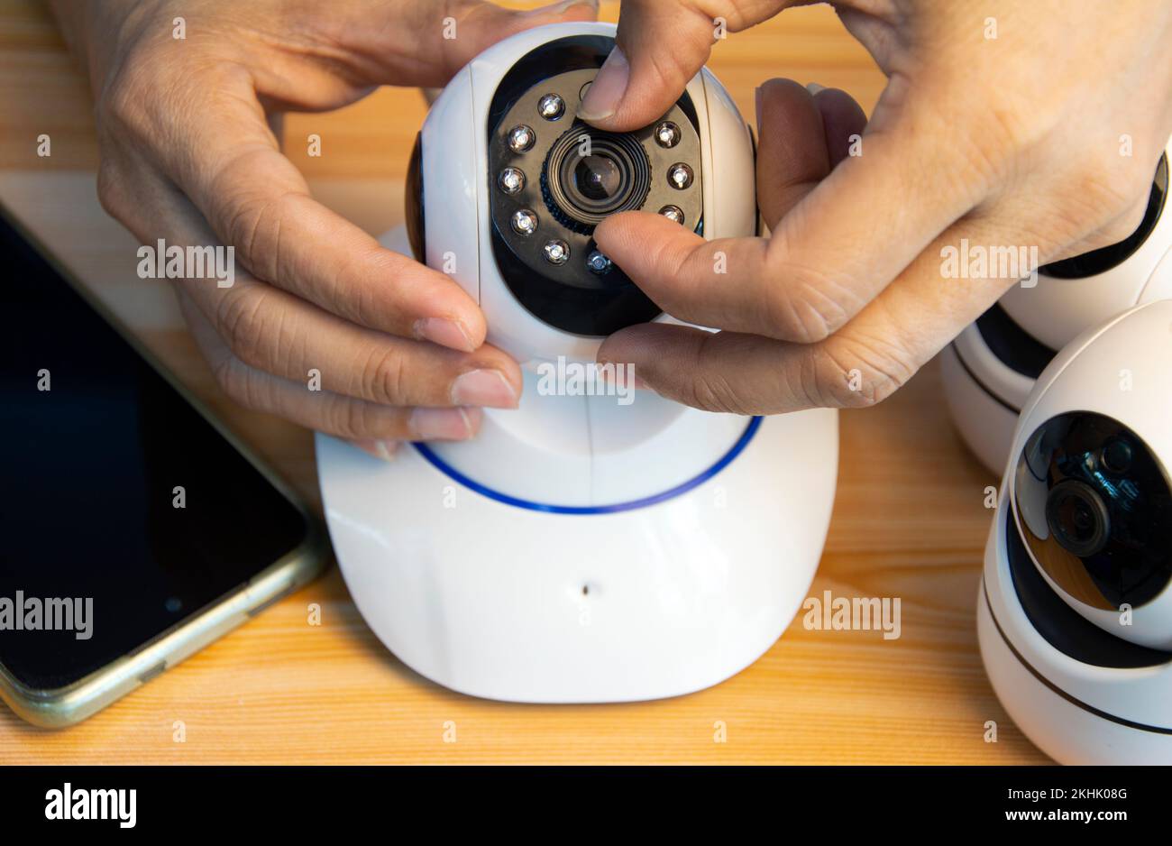 Conceptual man operating ip camera Stock Photo - Alamy