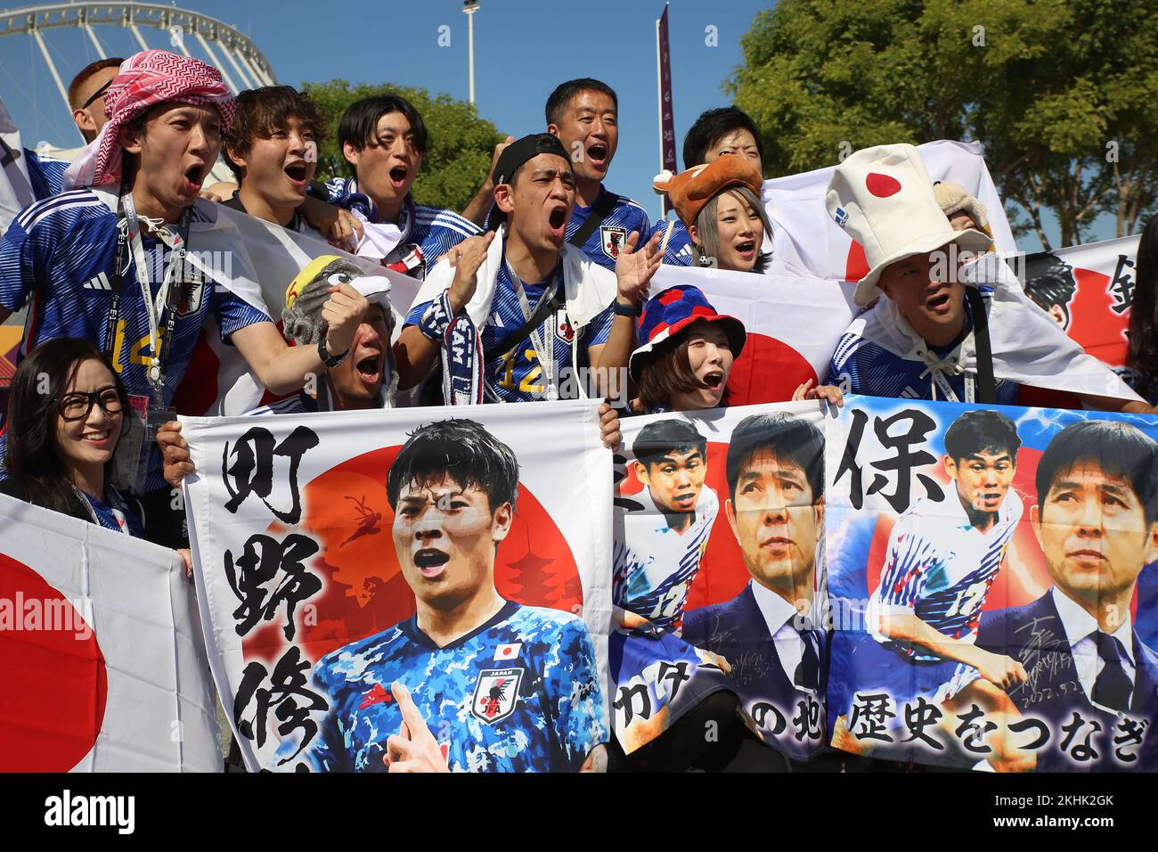 DOHA, QATAR - NOVEMBER 23: Japanese fans cheer before a FIFA World Cup ...