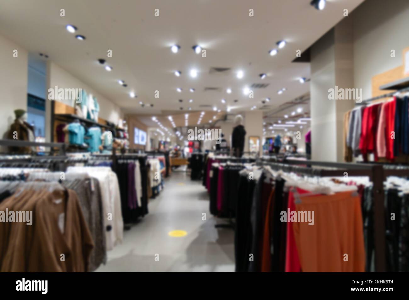 Blurry, abstract background of a clothing store in a shopping mall ...