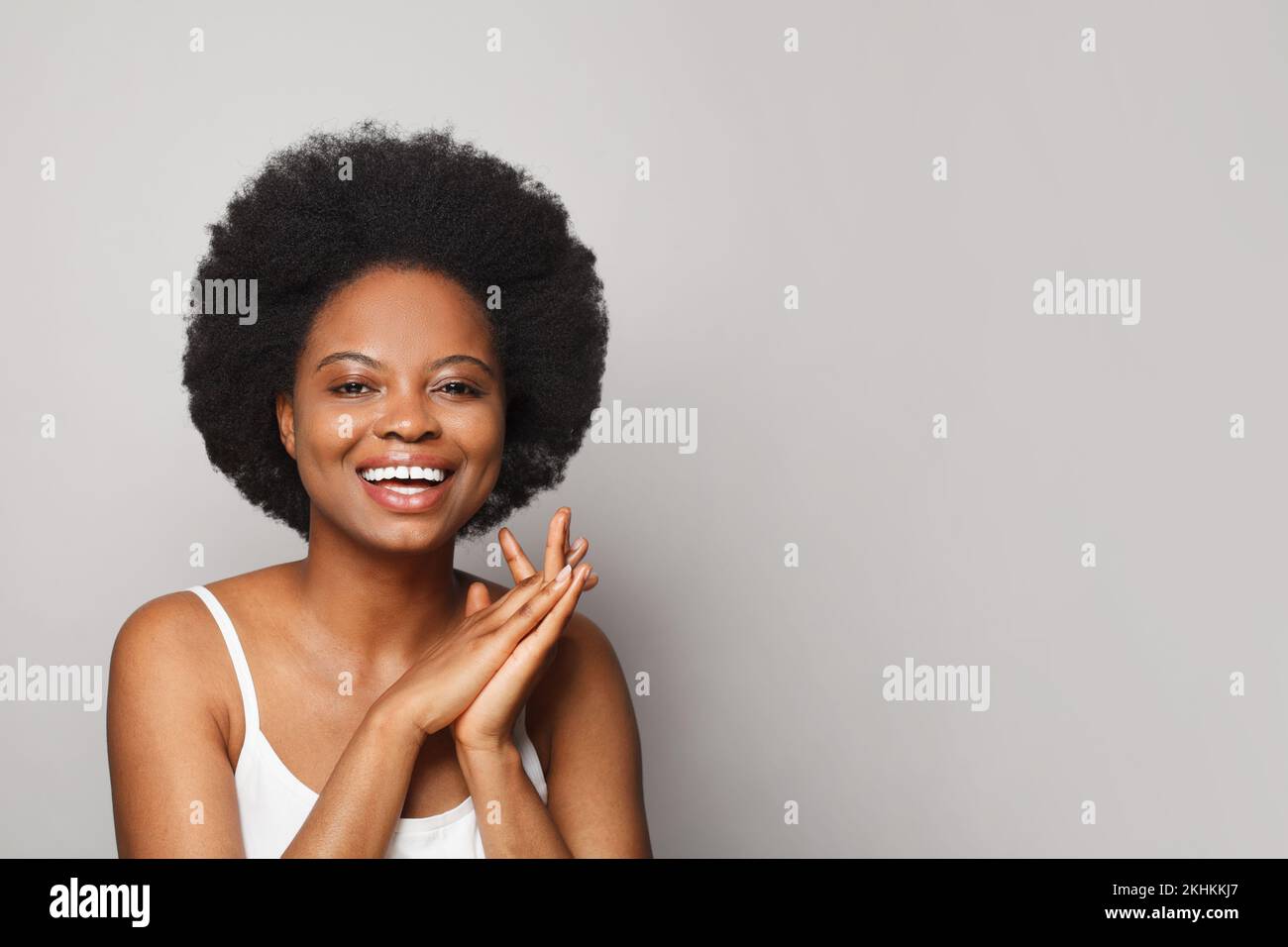 Cheerful perfect excited surprised happy young woman posing on white ...
