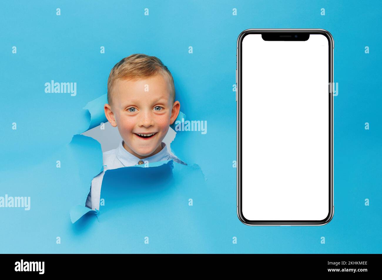Happy Cute Boy Is Having Fun Played On Blue Background Wall Climbs 5650