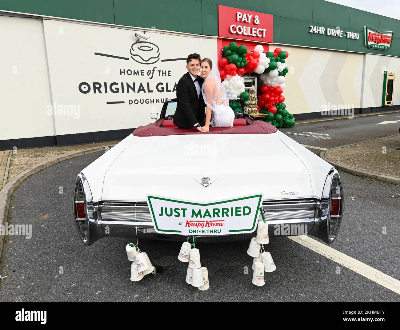 EDITORIAL USE ONLY Caroline and Elliot Laughton at Krispy Kreme's first ...