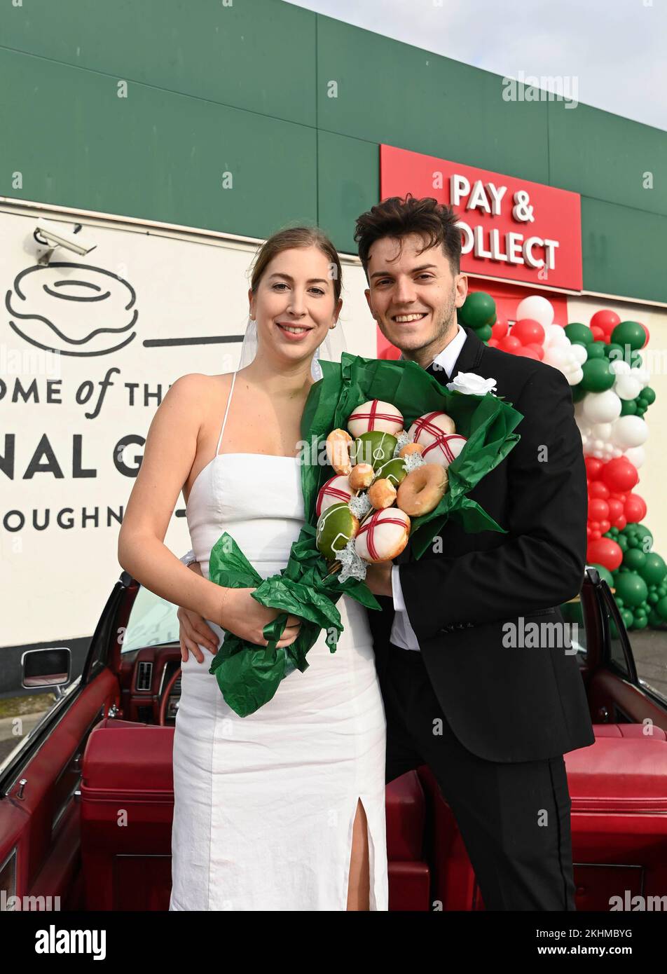 EDITORIAL USE ONLY Caroline and Elliot Laughton at Krispy Kreme's first ...