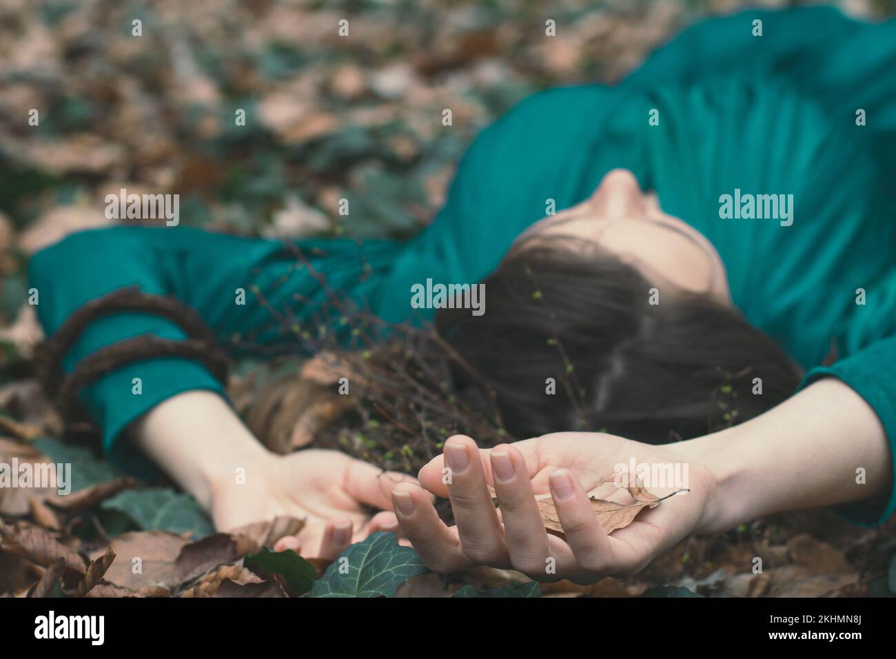 Woman lying on the ground side view hi-res stock photography and images ...