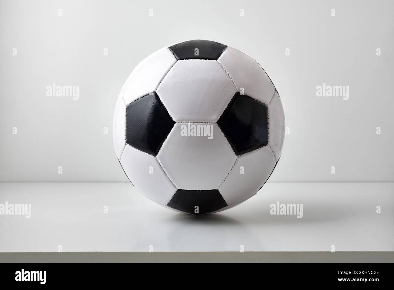 Detail view of classic black and white leather soccer ball isolated on ...