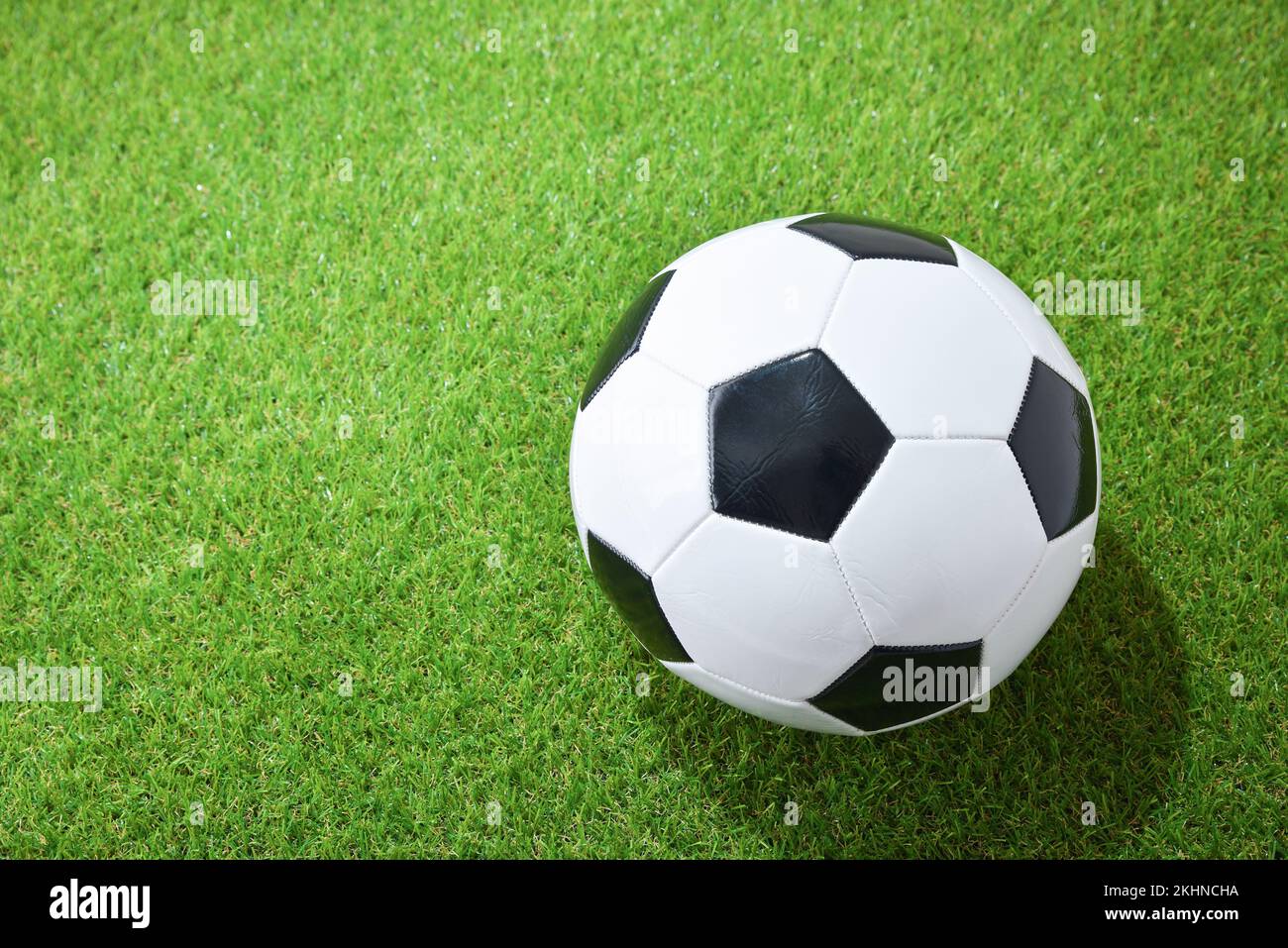 Detail of a Soccer ball on the grass close up. Top view. Horizontal ...