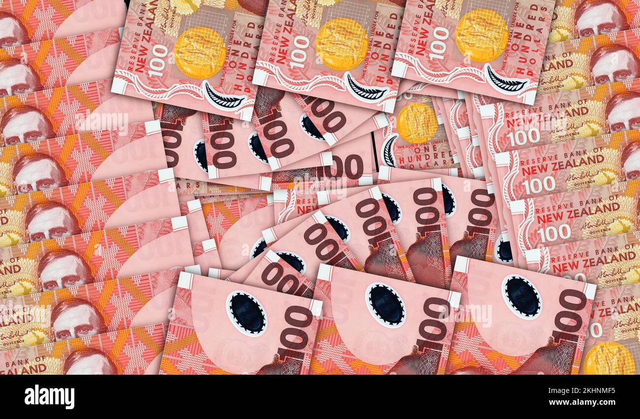 New Zealand Dollar banknotes in a cash fan mosaic pattern. 100 NDZ ...